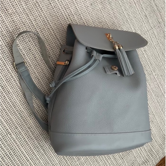 unbranded | Bags | Nwot Faux Leather Backpack With Tassel And Gold ...